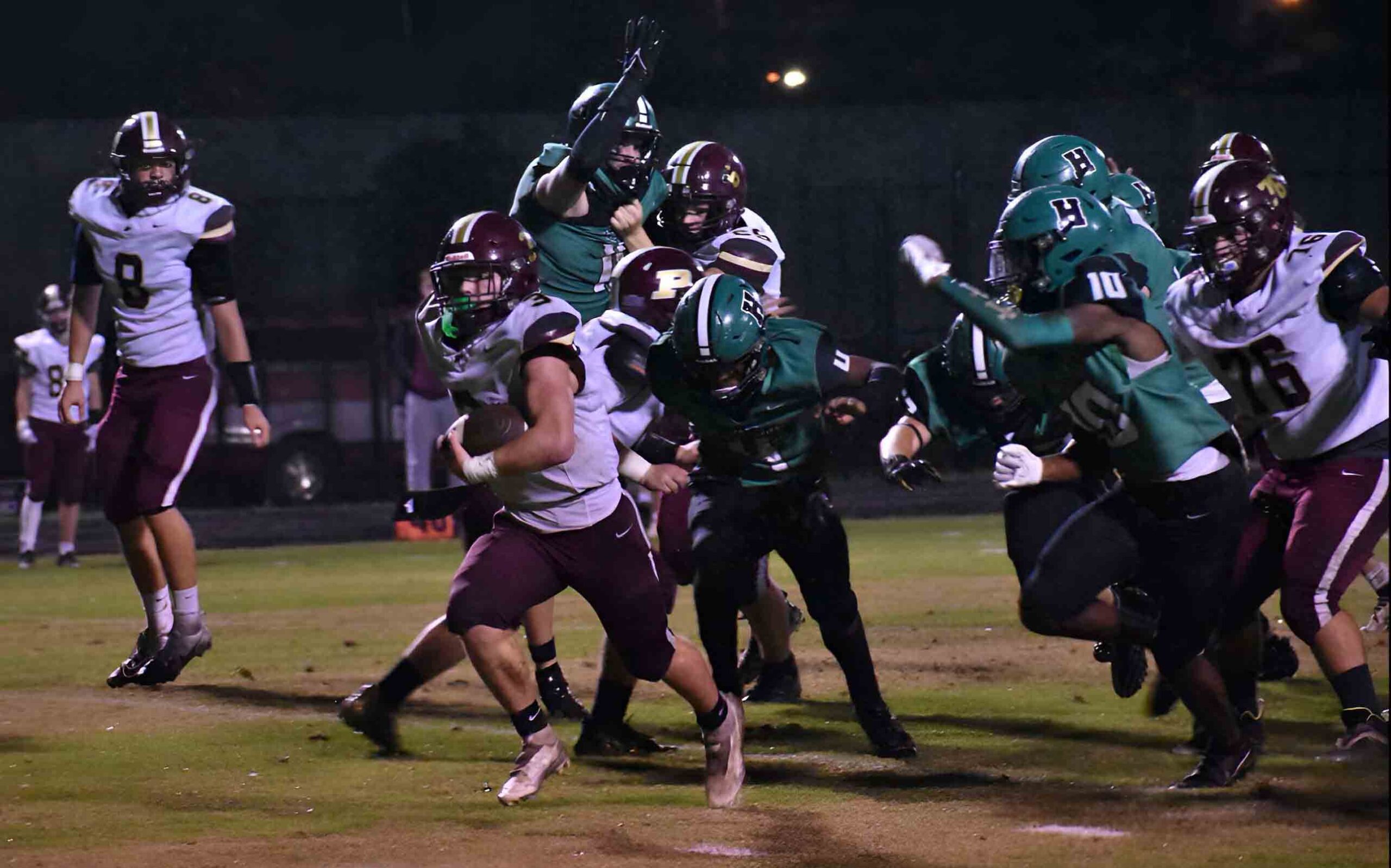 Akal runs for four TDs as Harlan overpowers Lions in Battle of 119 ...